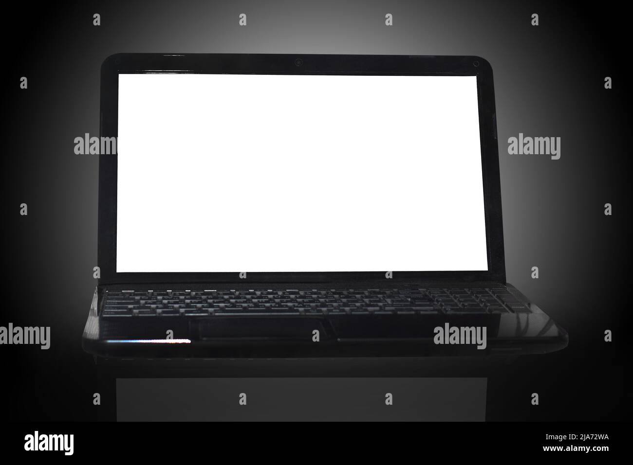 black laptop on black background with reflection Stock Photo - Alamy