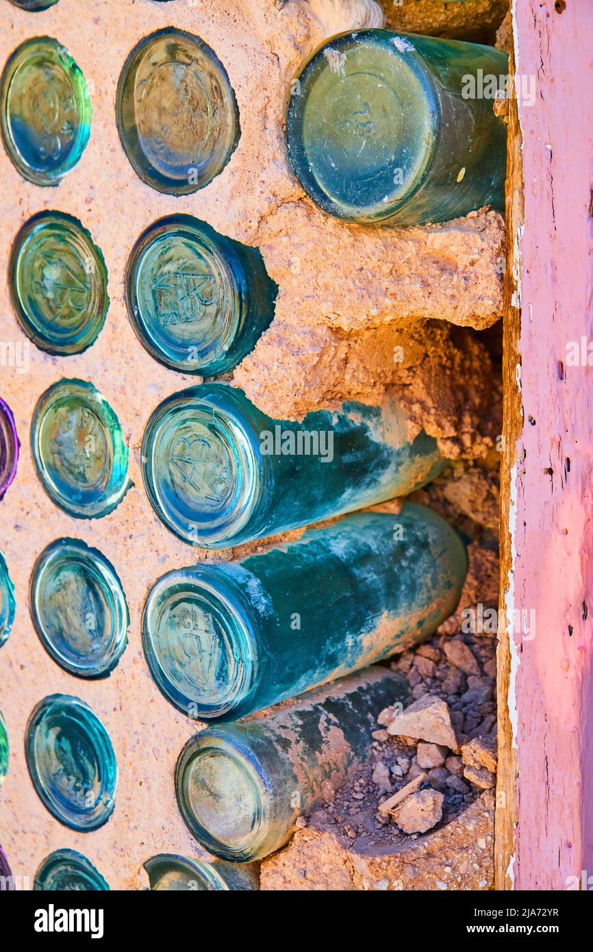Detail of glass bottle house by window in ghost town Stock Photo - Alamy