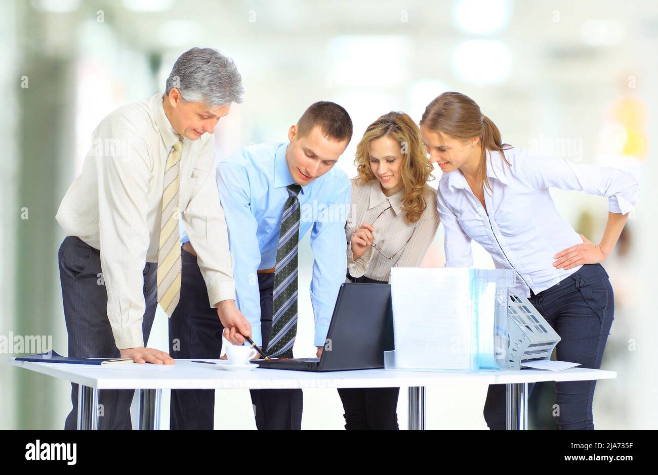 Group of businessmen the conclusion of the transaction Stock Photo - Alamy