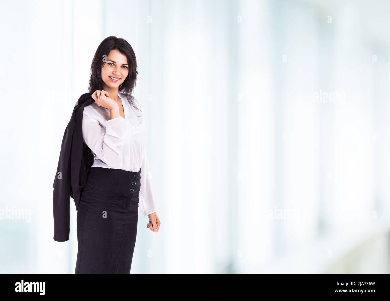 Young, attractive, successful business woman, confidently looking ...