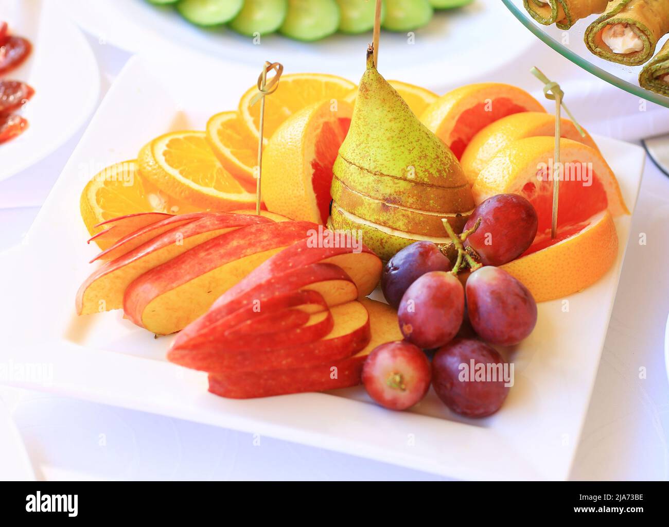 catering table set service with silverware and glass stemware at ...