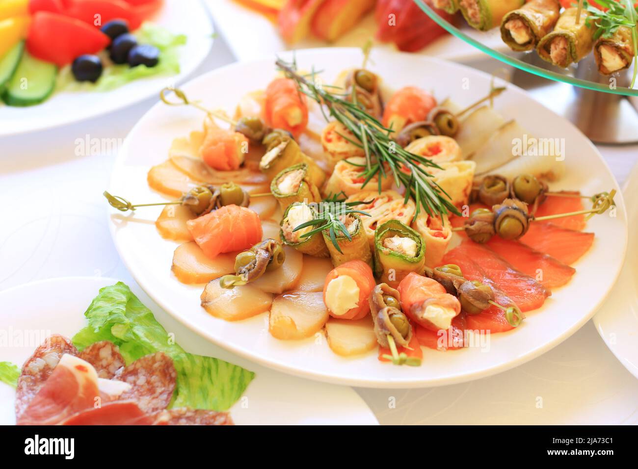 catering table set service with silverware and glass stemware at ...