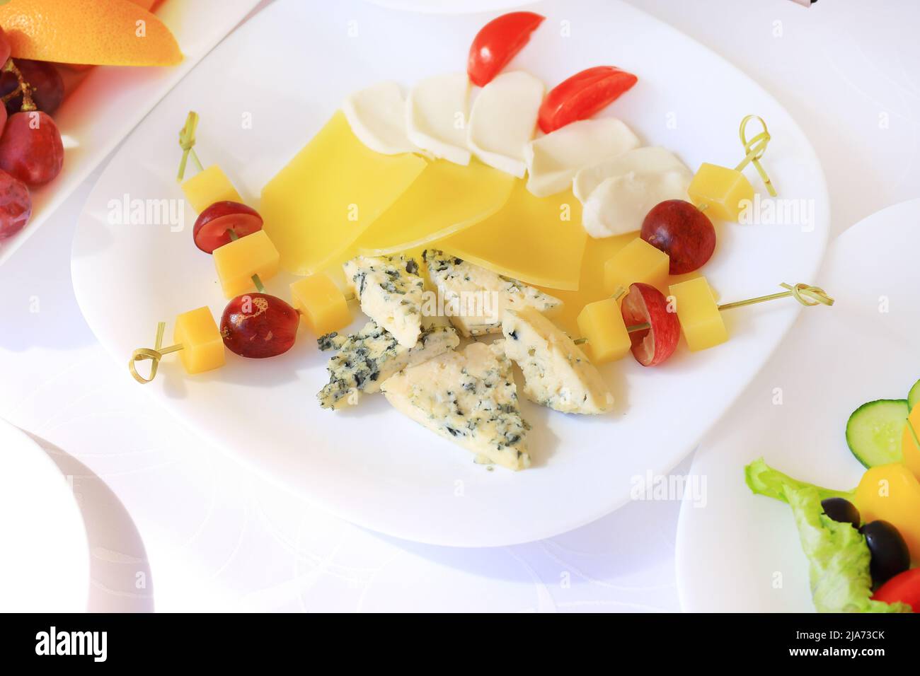 catering table set service with silverware and glass stemware at ...