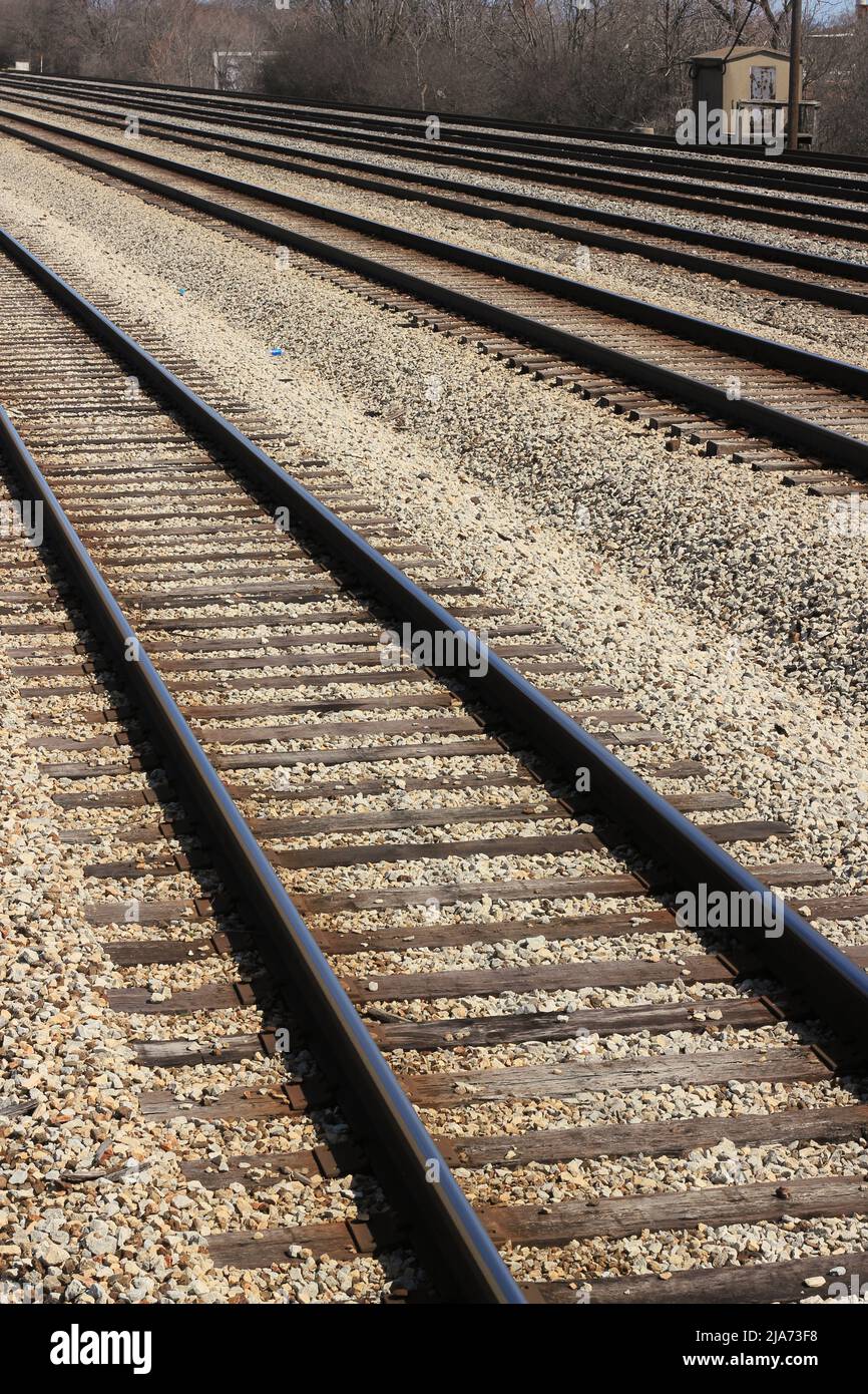 Typical common railroad tracks crossing the plains on a bright sunny ...