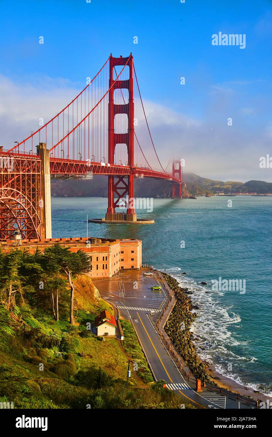 Fort underneath Golden Gate Bridge on foggy morning Stock Photo - Alamy