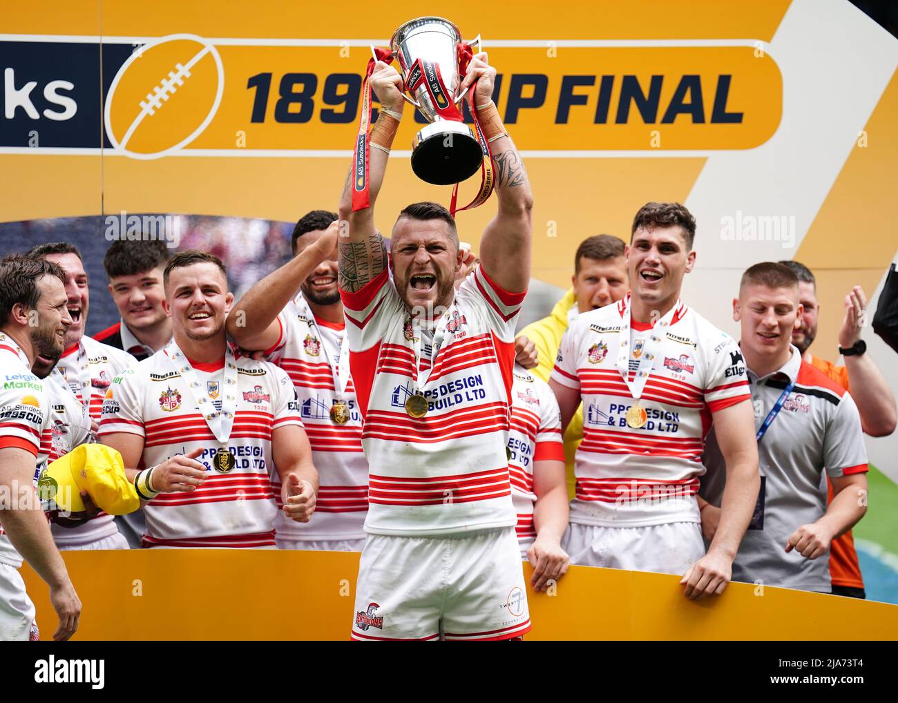 Leigh Centurions' Adam Sidlow lifts the trophy following the AB ...