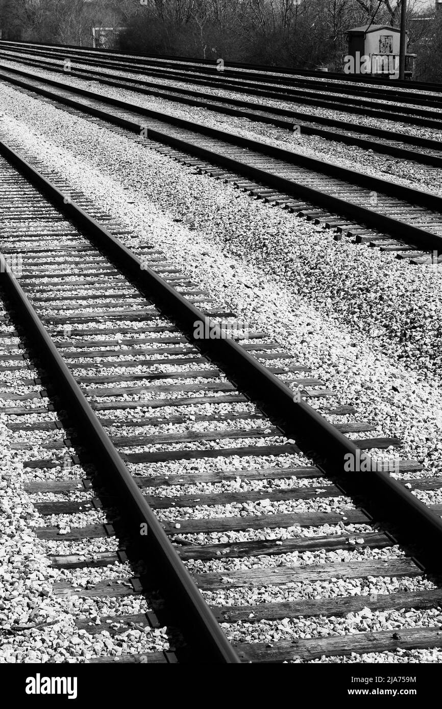 Typical common railroad tracks crossing the plains on a bright sunny ...