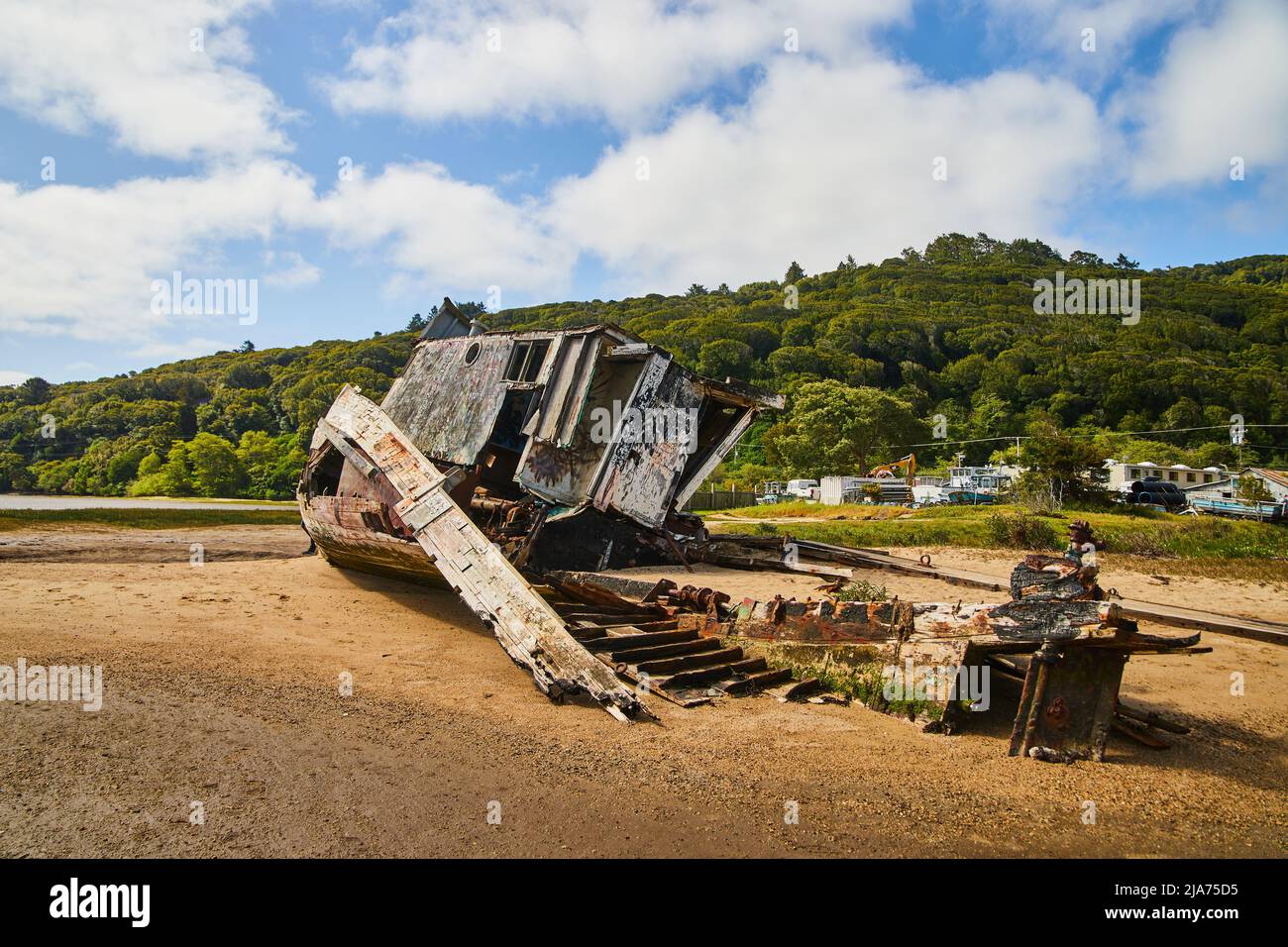 Back of shipwreck on sandy beach falling apart Stock Photo - Alamy