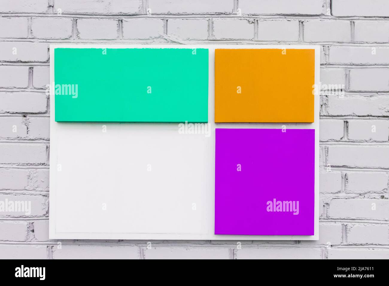 Colored empty squares abstract design blank cubes on white urban brick ...