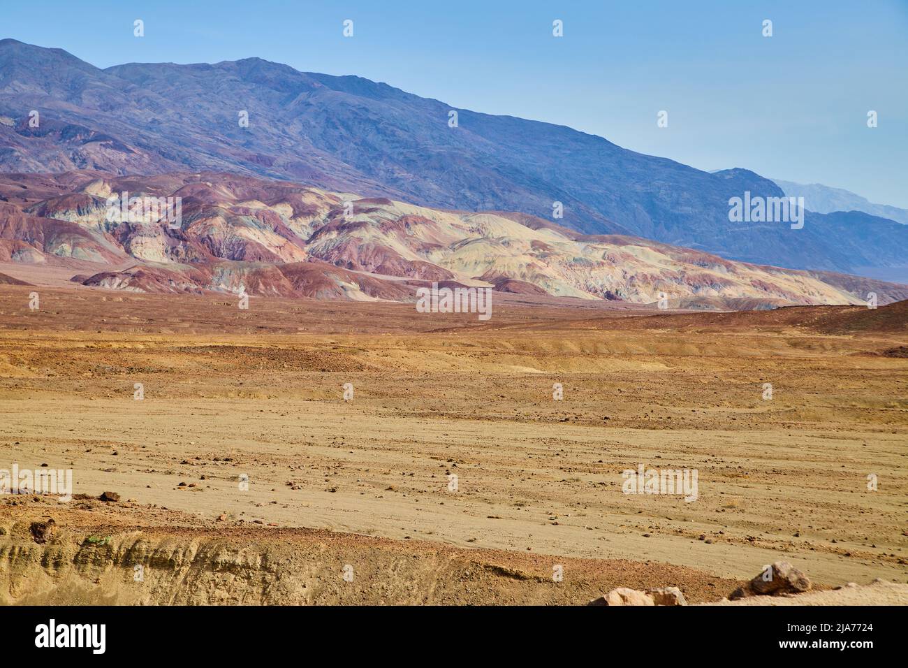 Desert with layers of colorful mountains Stock Photo - Alamy