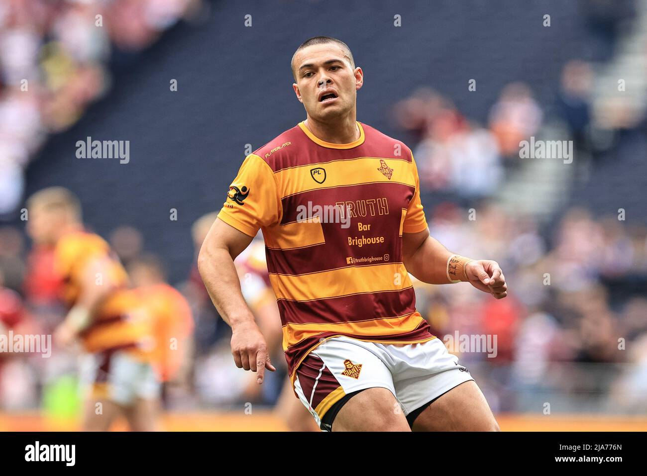 Tui Lolohea #6 of Huddersfield Giants during pre-game warm up Stock ...