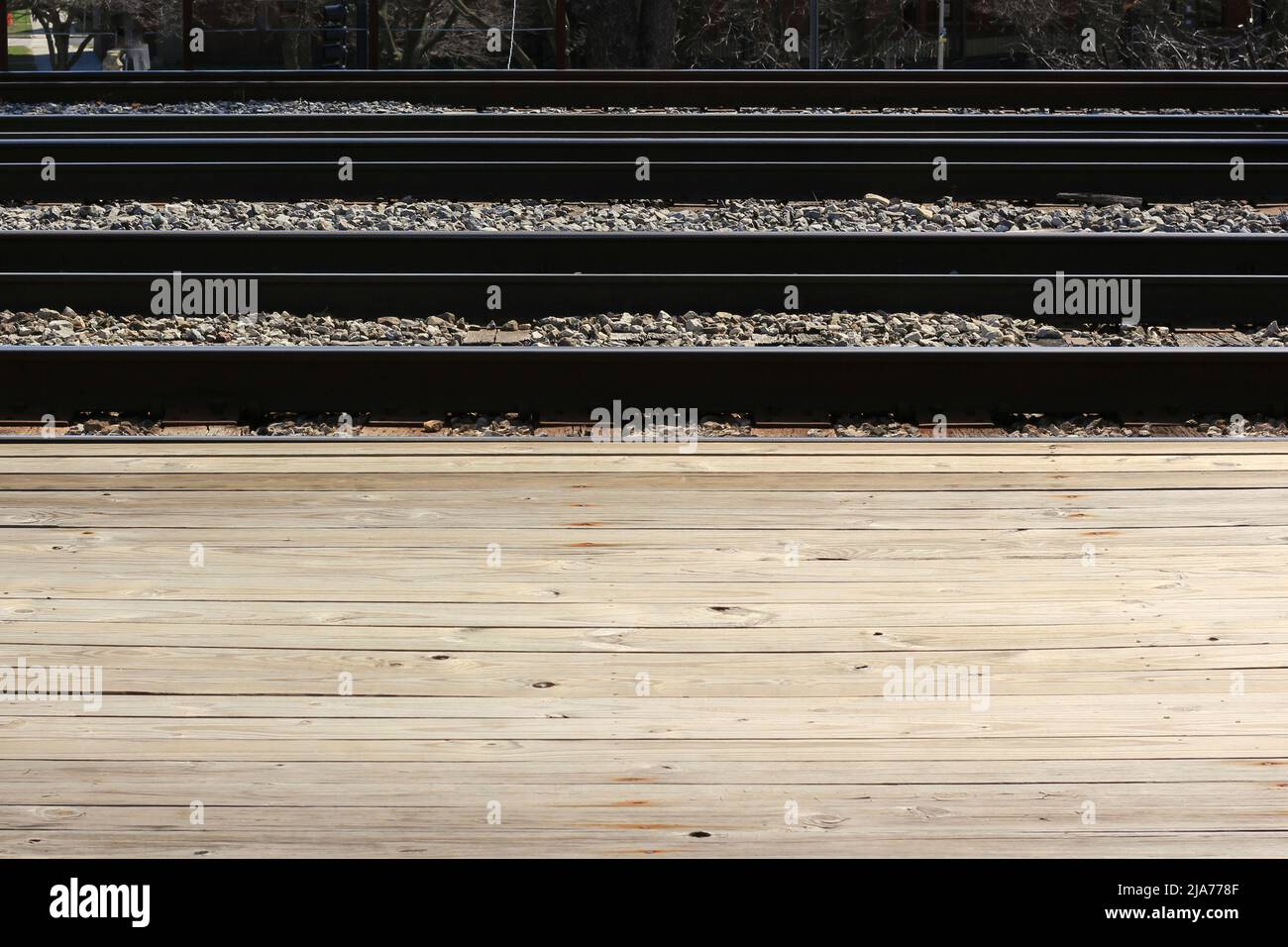 Typical common railroad tracks crossing the plains on a bright sunny ...