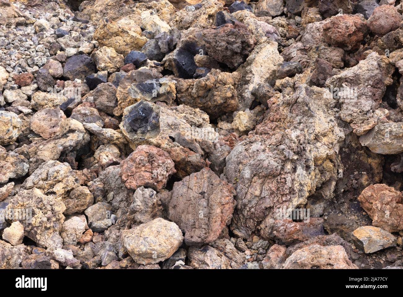 Colorful background volcanic rock near Volcan de Teneguia at La Palma ...