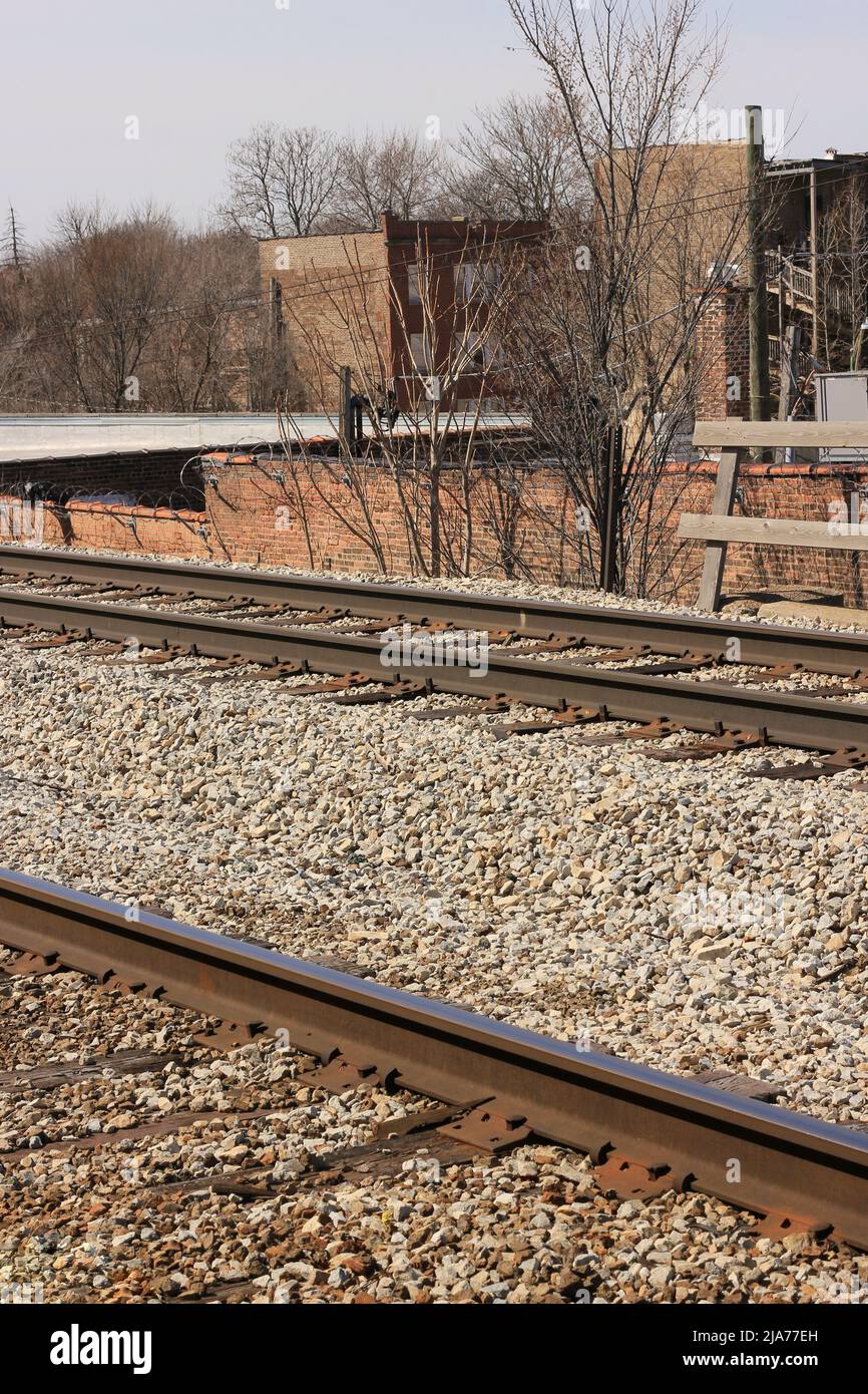 Typical common railroad tracks crossing the plains on a bright sunny ...