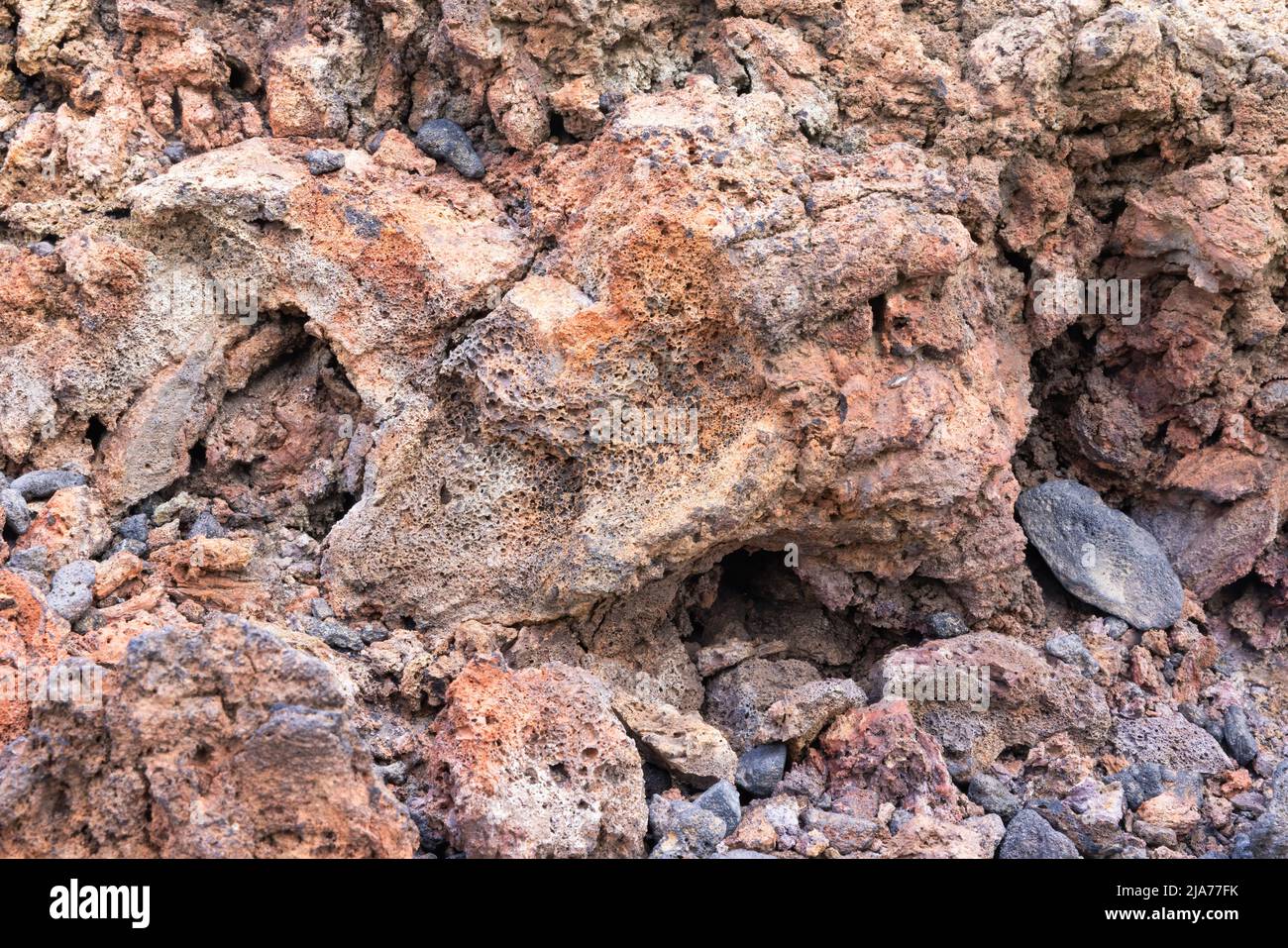 Colorful background volcanic rock near Volcan de Teneguia at La Palma ...