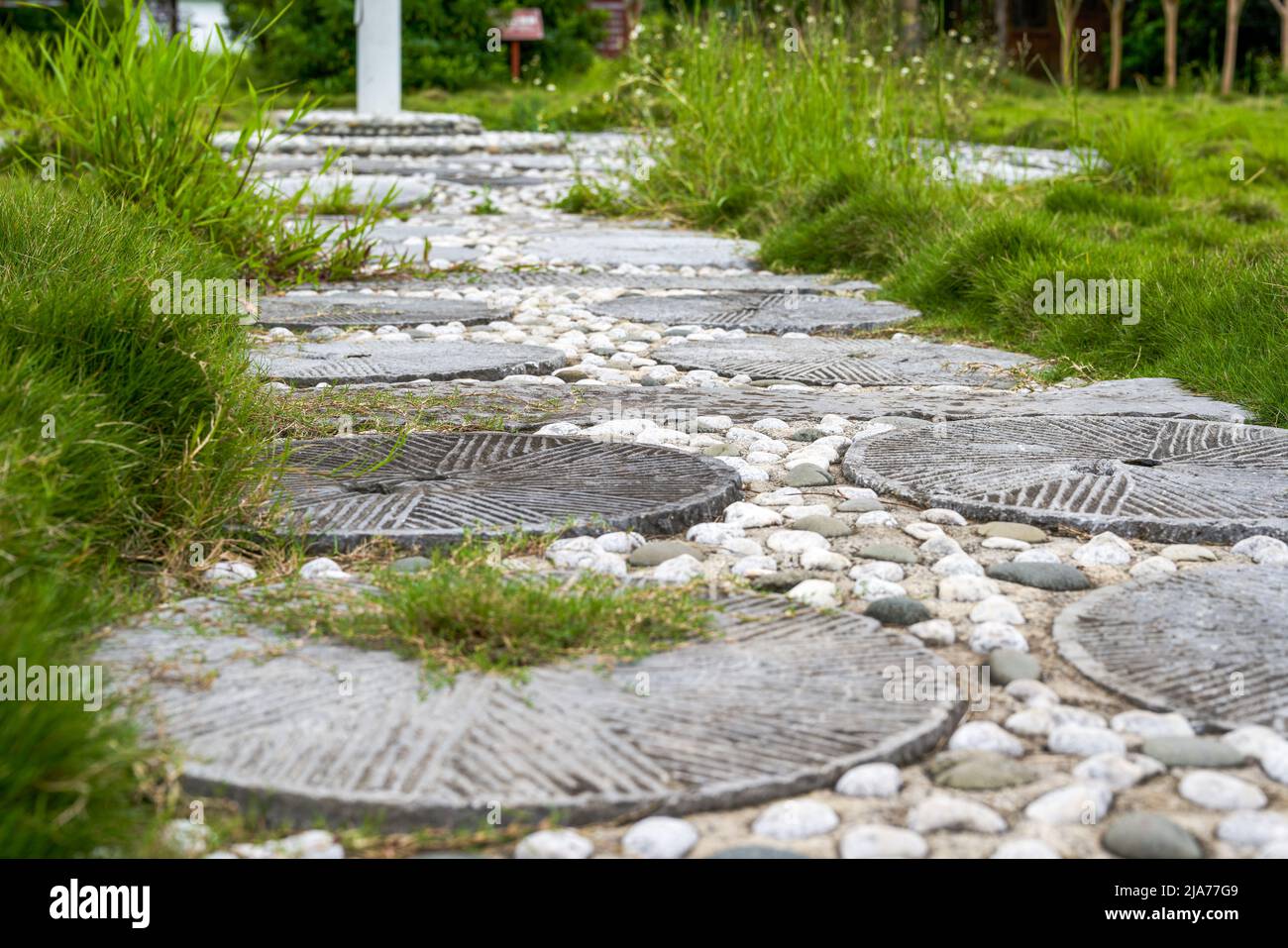 Landscape decorated with traditional stone mill in Chinese garden Stock ...