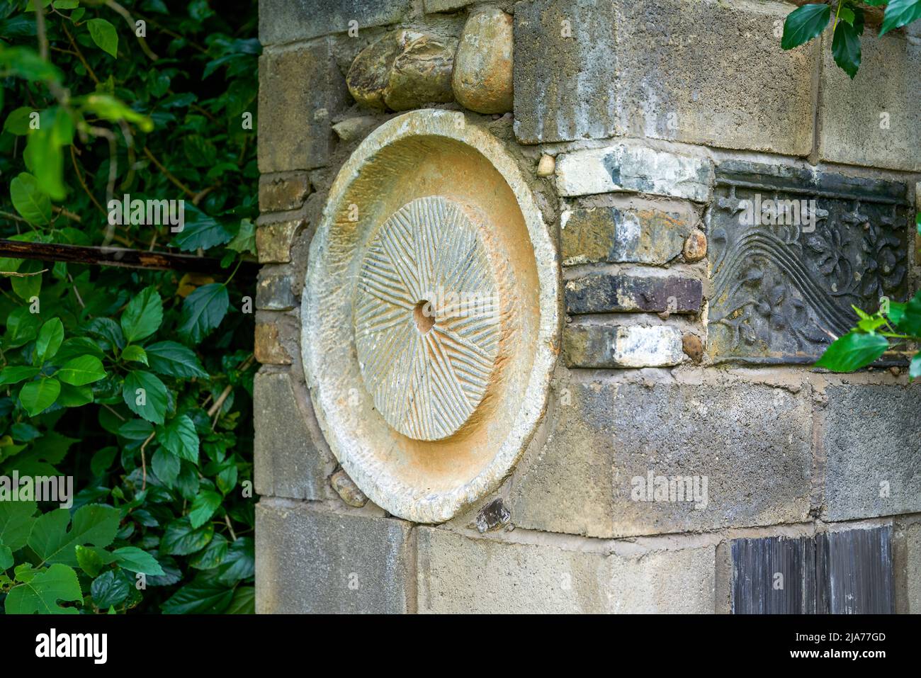 Landscape decorated with traditional stone mill in Chinese garden Stock ...