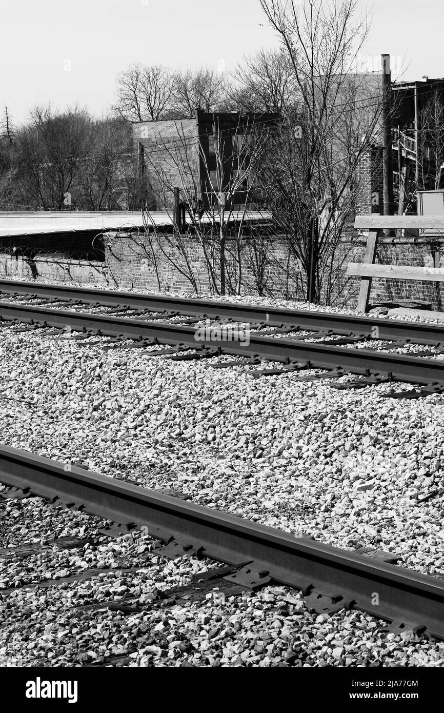 Typical common railroad tracks crossing the plains on a bright sunny ...