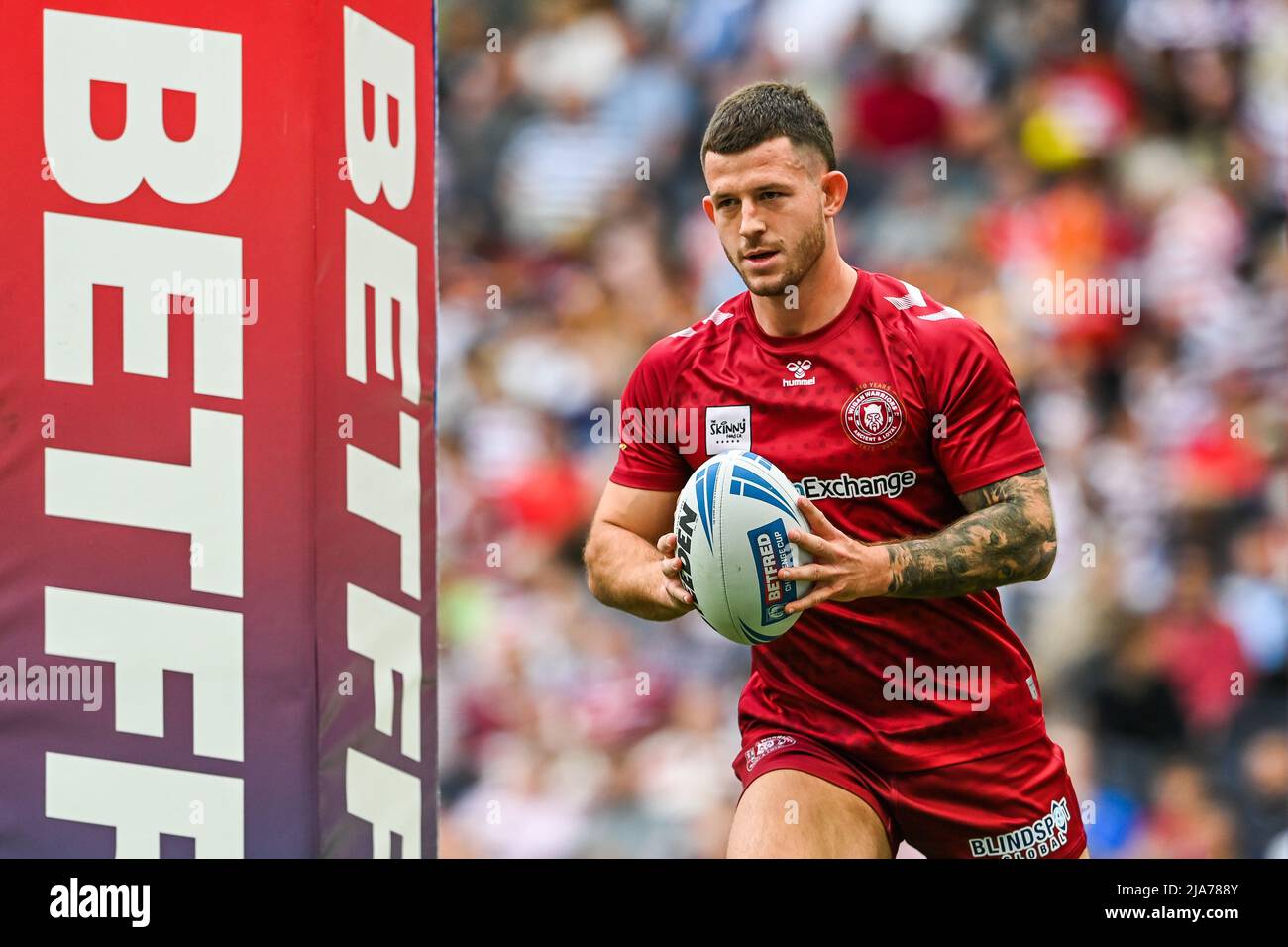 Cade Cust #6 of Wigan Warriors during pre match warm up Stock Photo - Alamy