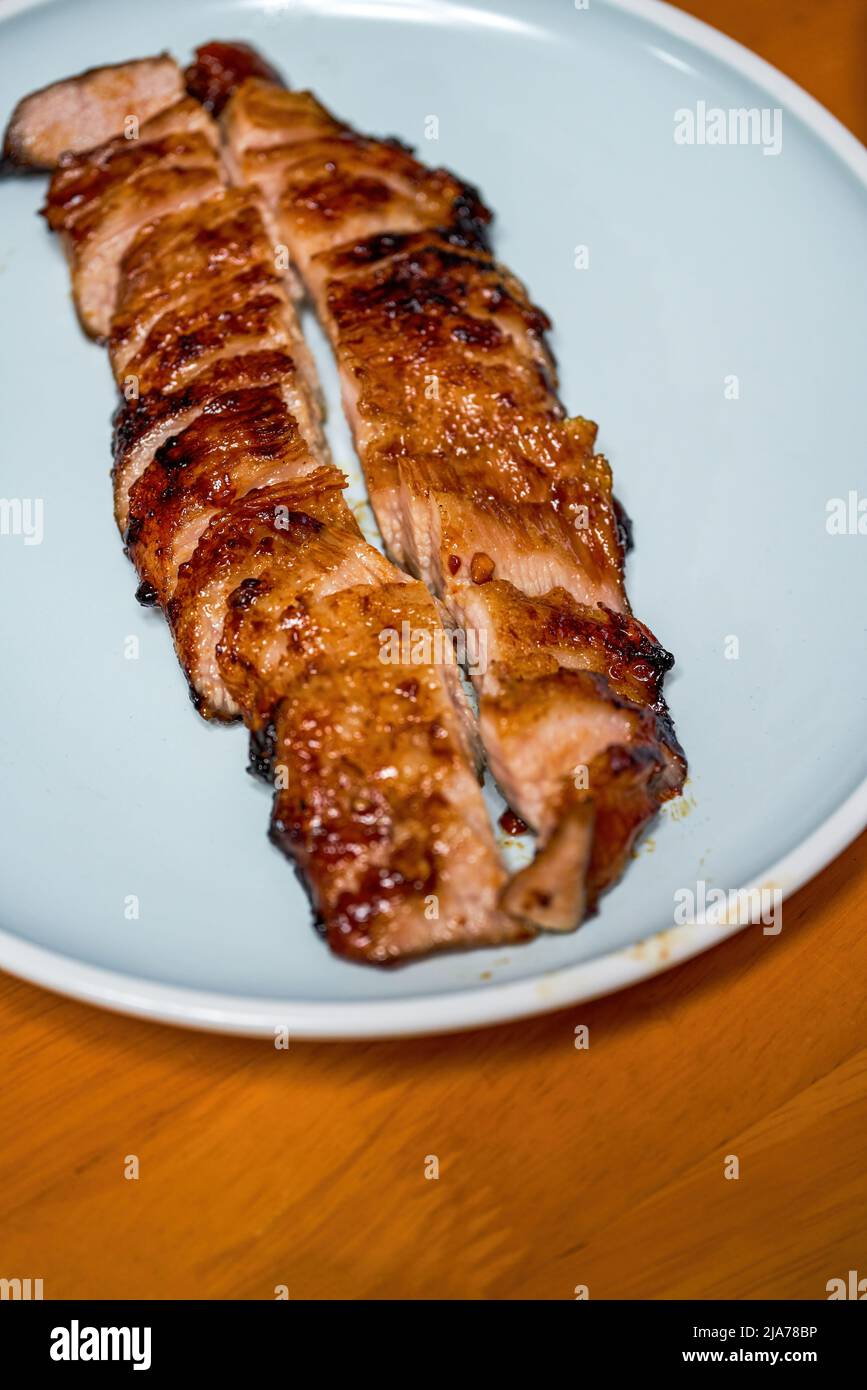 A delicious and tempting charcoal-grilled pork neck Stock Photo - Alamy
