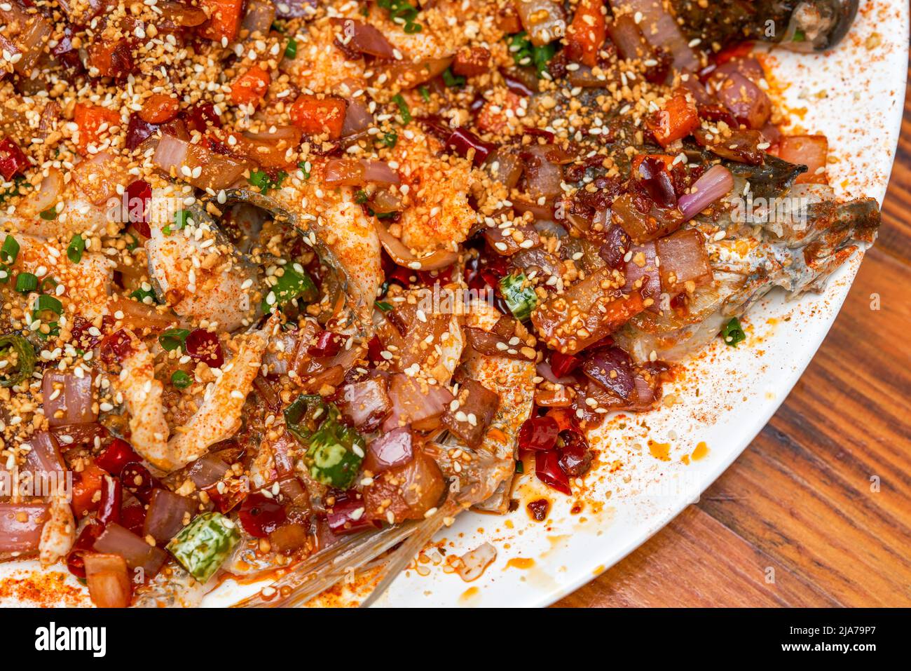 A spicy and delicious Sichuan dish, oily and spicy fish fillets Stock ...