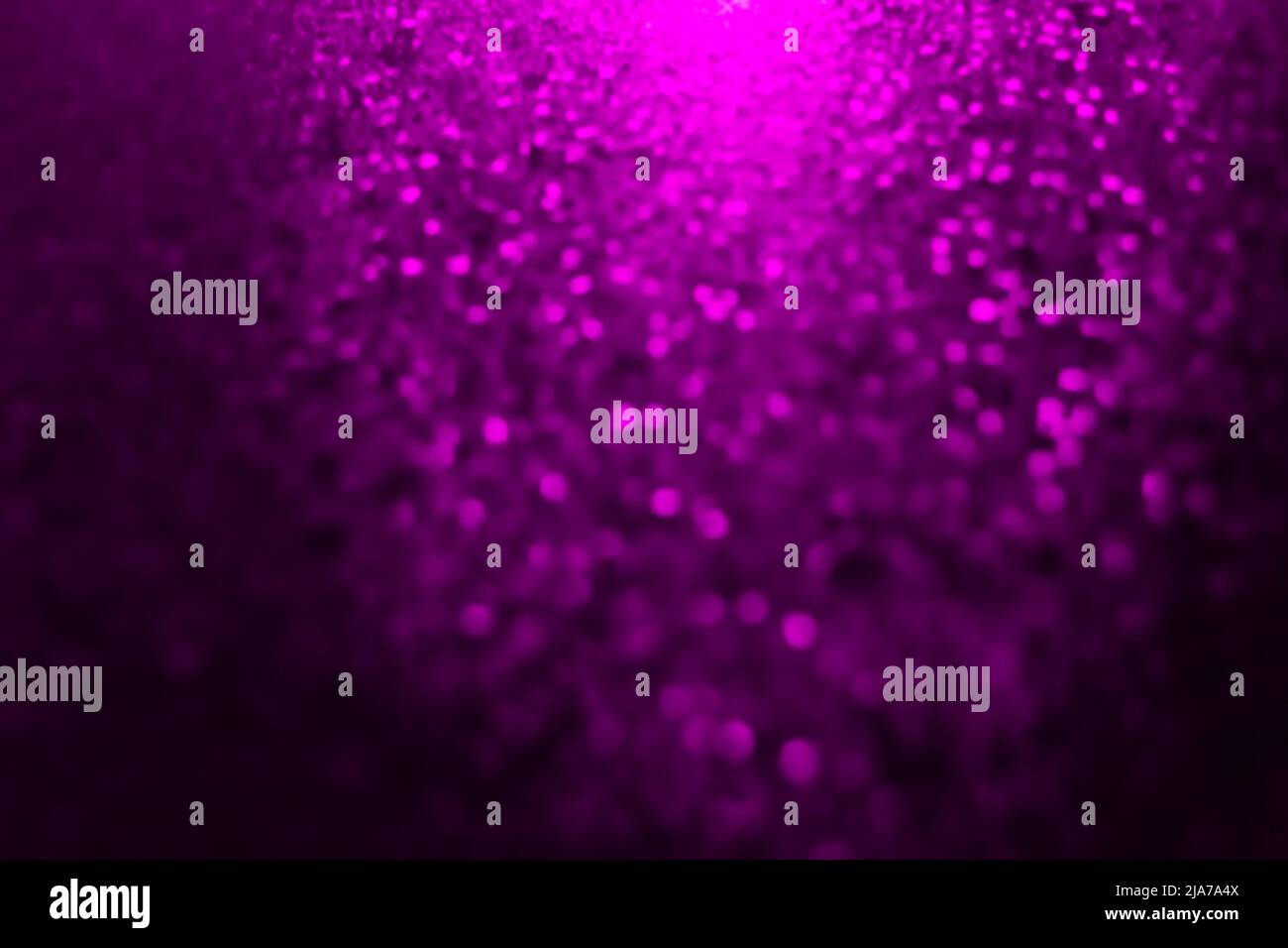 Blurred shiny background surface spot with neon purple pink light ...