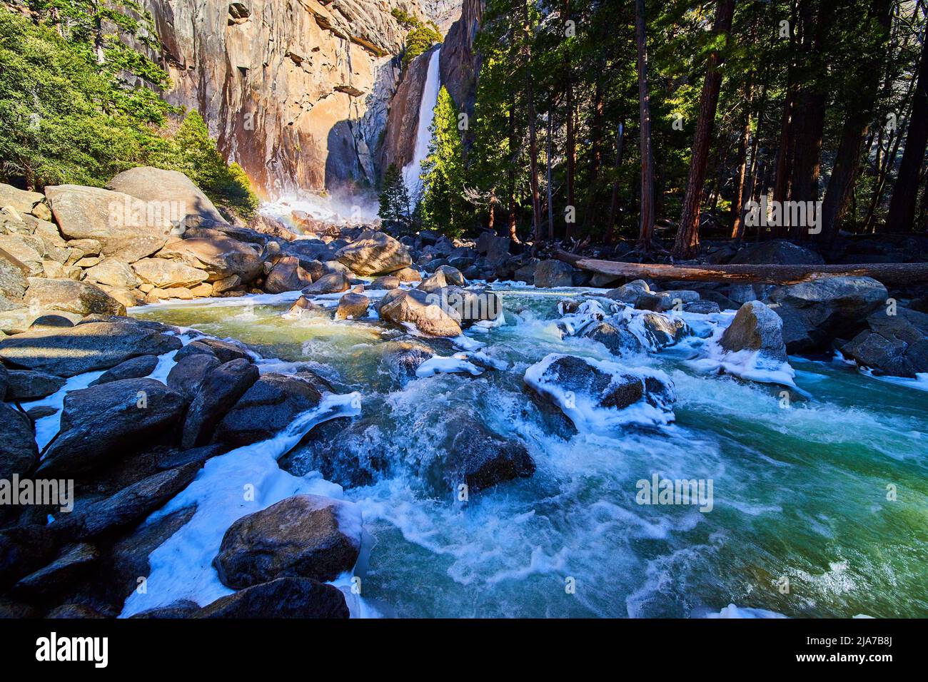 Early spring at Yosemite with slushy rivers and rainbow by Yosemite ...