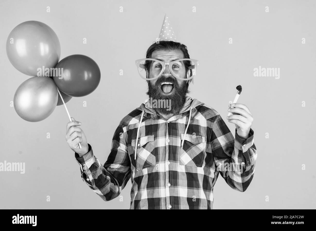 stylish bearded guy with trendy hairstyle wear checkered shirt hold ...