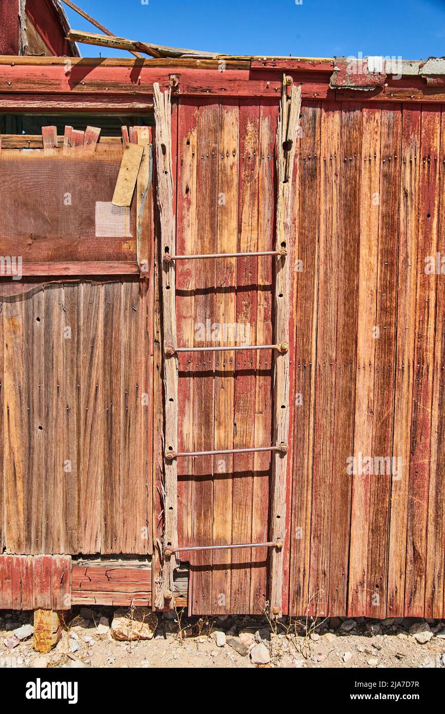 Ghost town abandoned train from side with ladder Stock Photo - Alamy