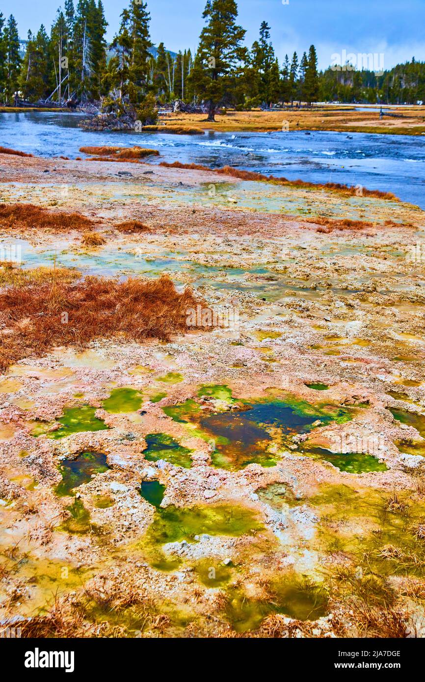 Colorful pools of water in Yellowstone Stock Photo - Alamy
