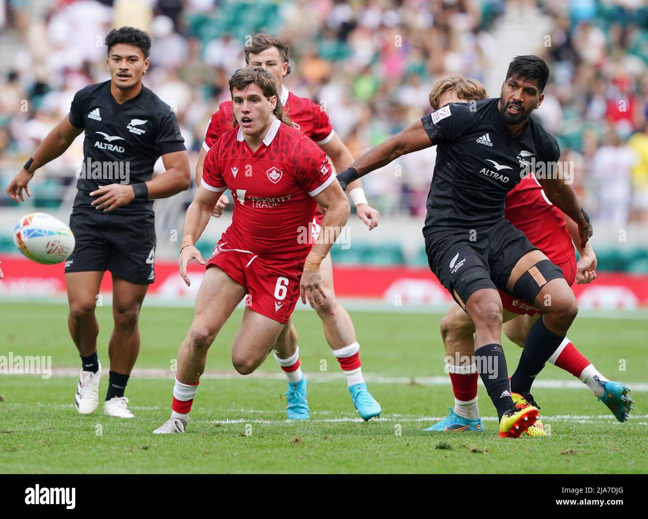 Canada's Thomas Isherwood (centre), New Zealand's Dylan Collier (right ...