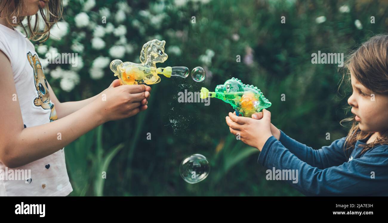 Pony, dinosaur soap bubble gun shooter, blower. Battle, party for kids. Girls,chidren playing ...