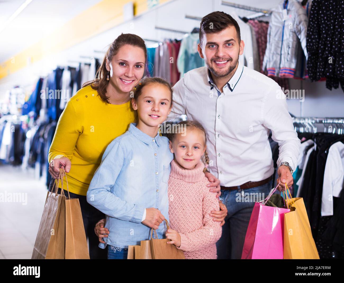 Family after shopping in store Stock Photo - Alamy