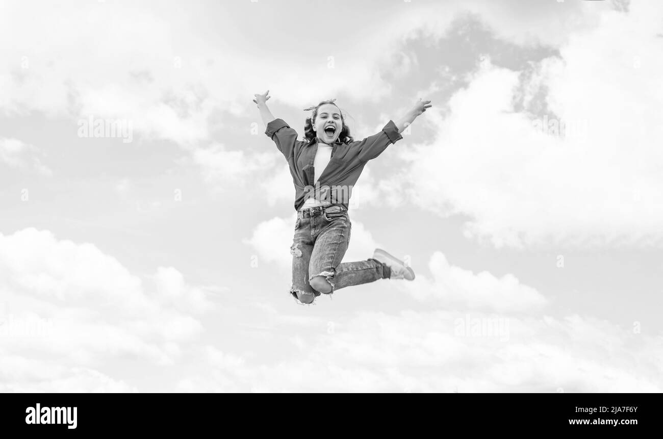 Happy child jumping high in Black and White Stock Photos & Images - Alamy