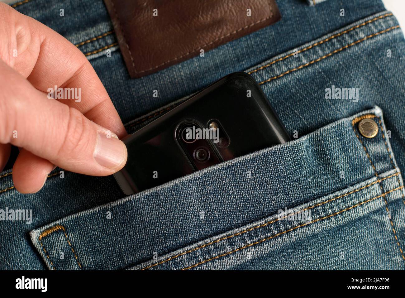 Mobile phone back pocket hi-res stock photography and images - Alamy
