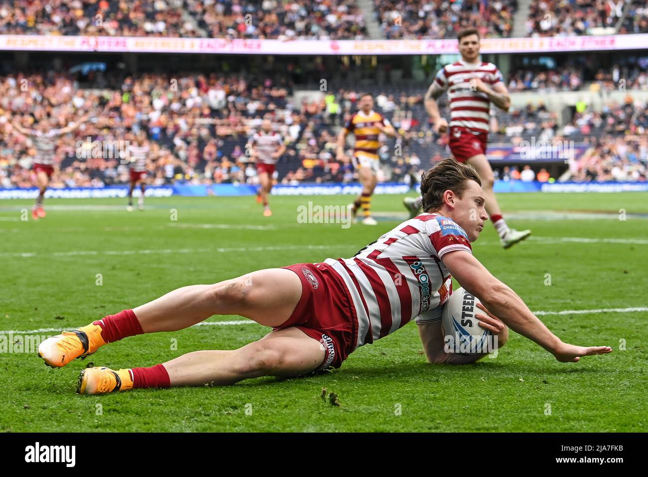 Jai Field #23 of Wigan Warriors goes over for a try in , on 5/28/2022 ...