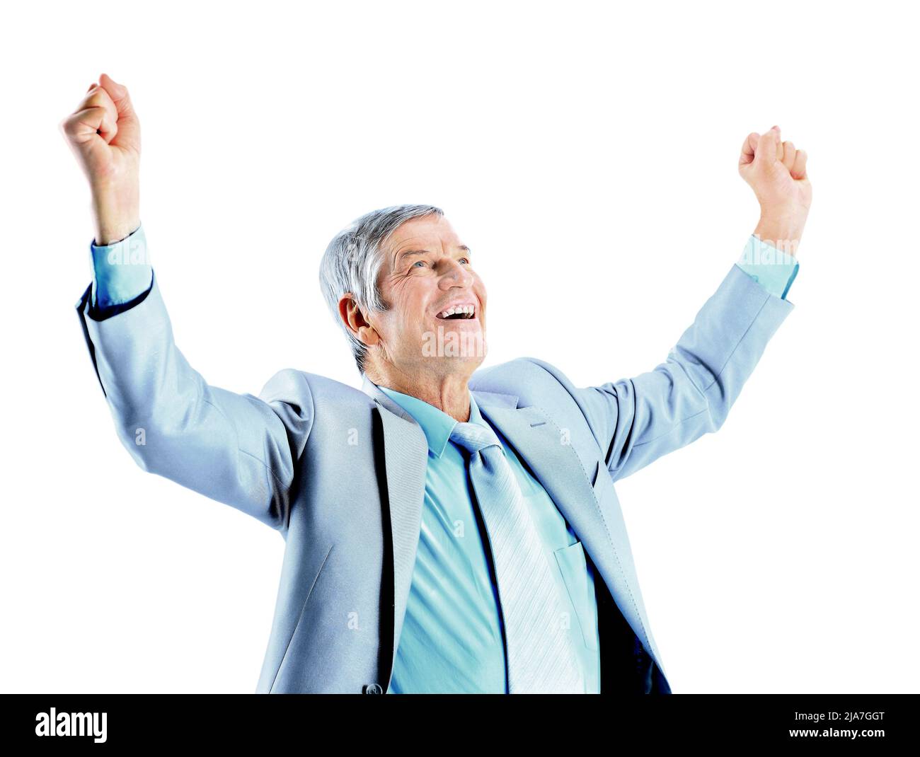 Full length of mature business man celebrating victory on white ...
