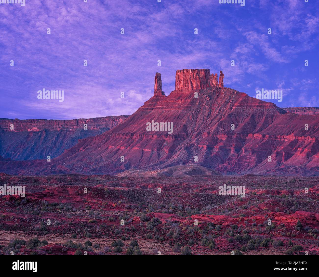 Rock formation known as the Rectory at sunrise in Castle Valley near ...