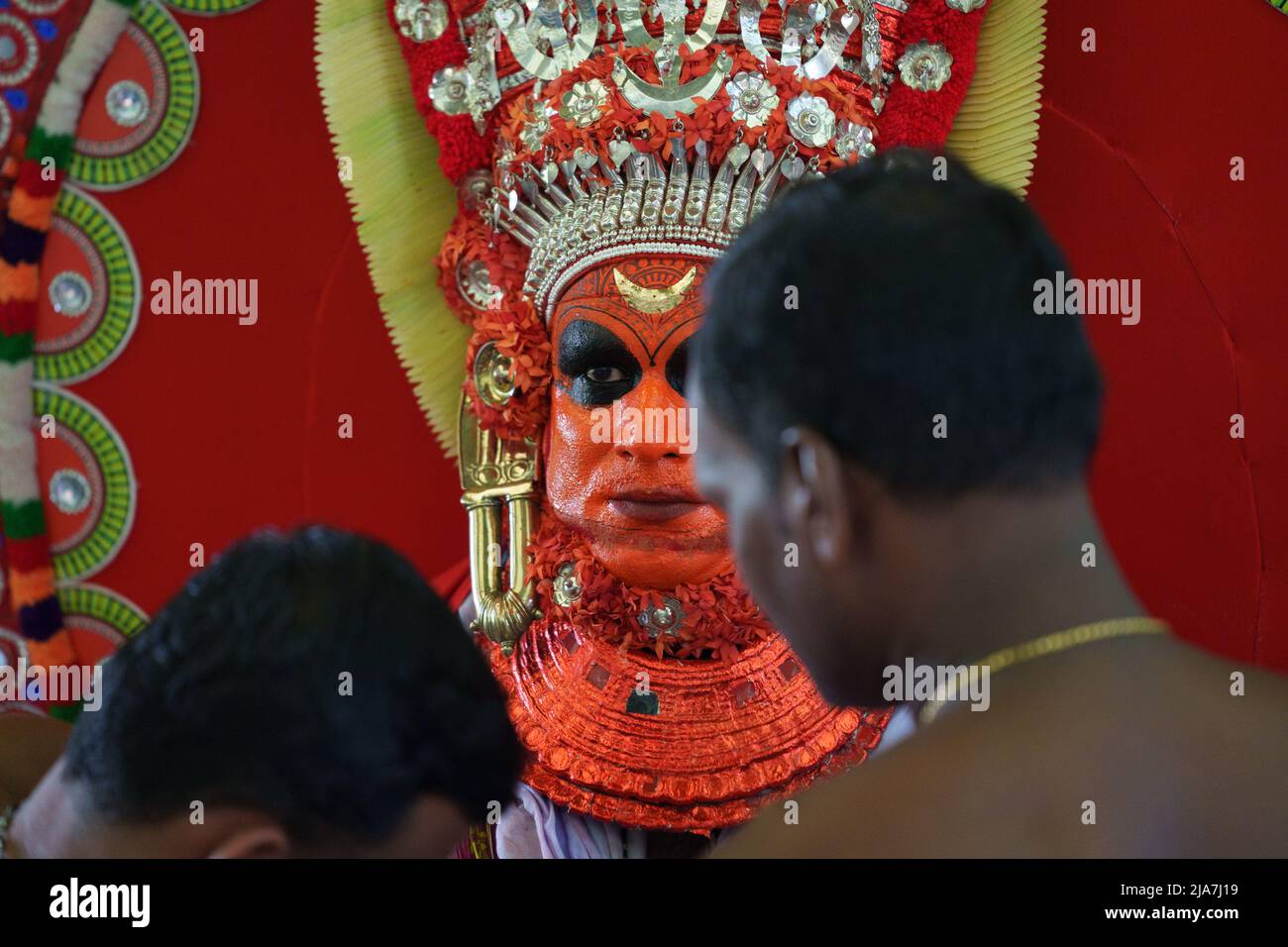 Theyyam is a famous ritual art form in kerala with face painted using ...