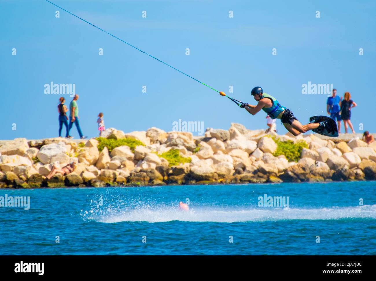 Active wakesurfer jumping on wake board at Varna beach,Bulgaria.Active ...