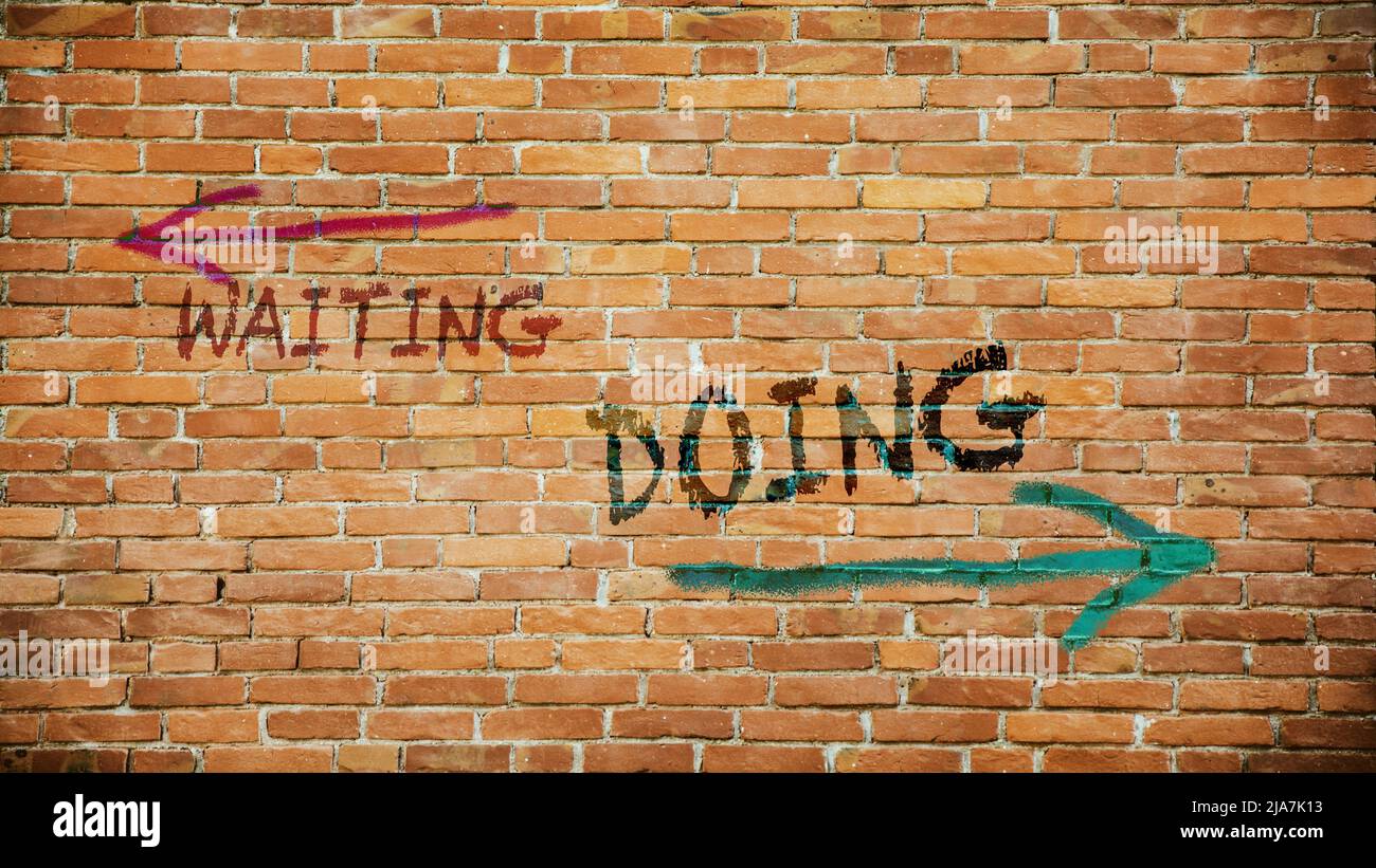 Street Sign the Direction Way to Doing versus Waiting Stock Photo - Alamy