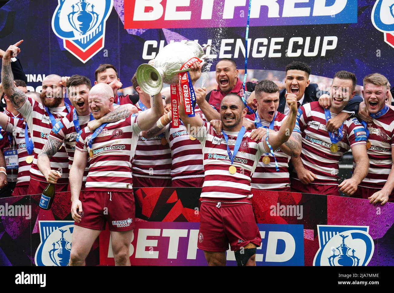 Wigan Warriors' Liam Farrell and Thomas Leuluai lift the trophy ...