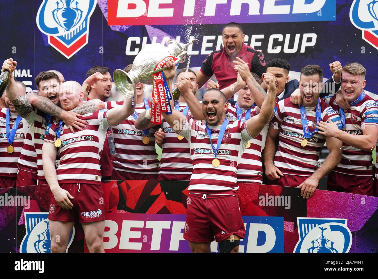 Wigan Warriors' Liam Farrell and Thomas Leuluai lift the trophy ...