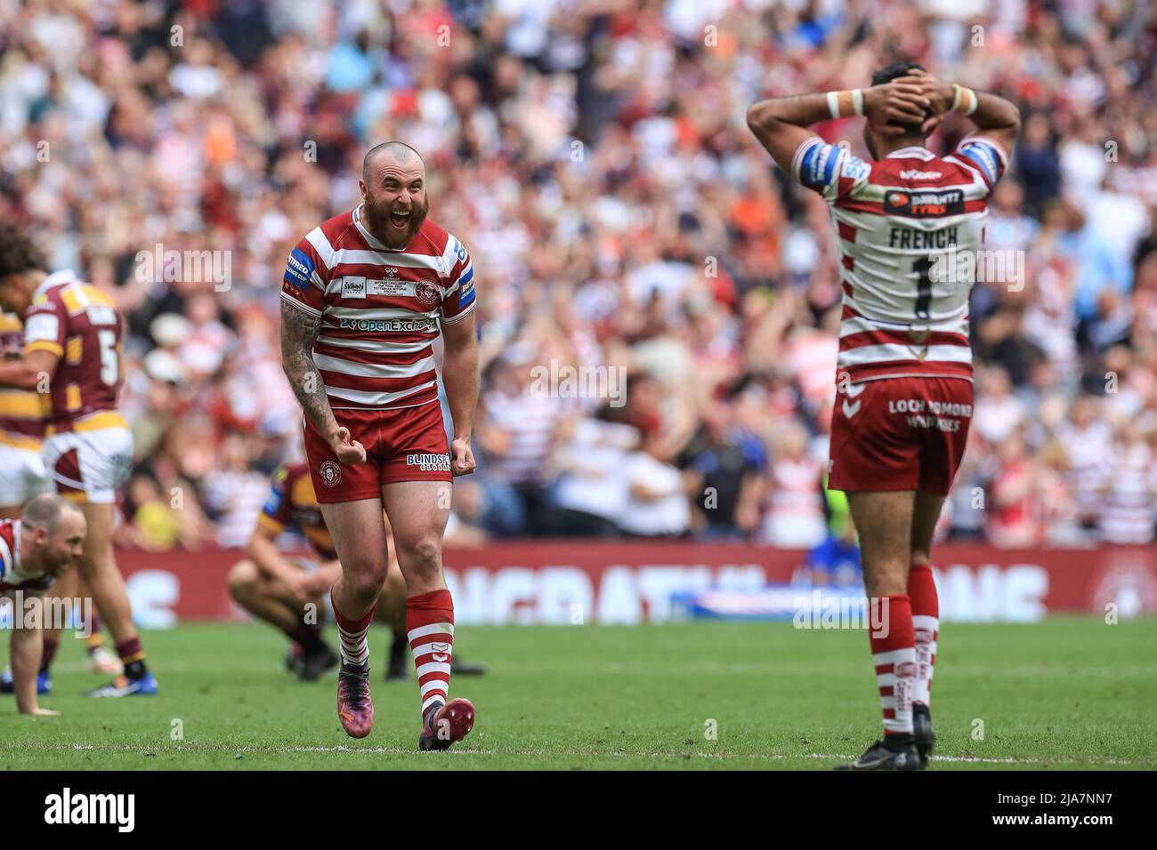 Jake Bibby 2 #of Wigan Warriors celebrates the cup win with Bevan ...
