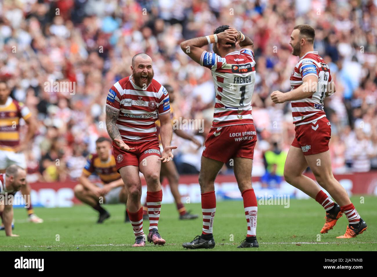 Jake Bibby 2 #of Wigan Warriors celebrates the cup win with Bevan ...