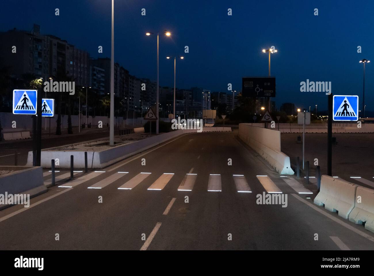 Pedestrian crossing illuminated at night Stock Photo - Alamy