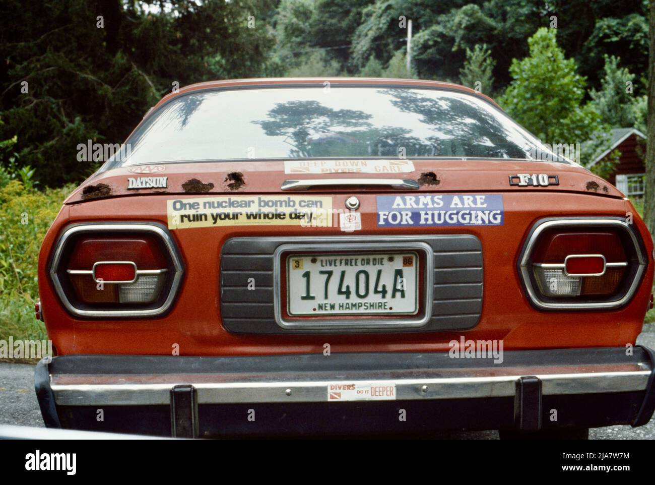 New Hampshire registered car with funny bumper stickers in 1985. USA ...