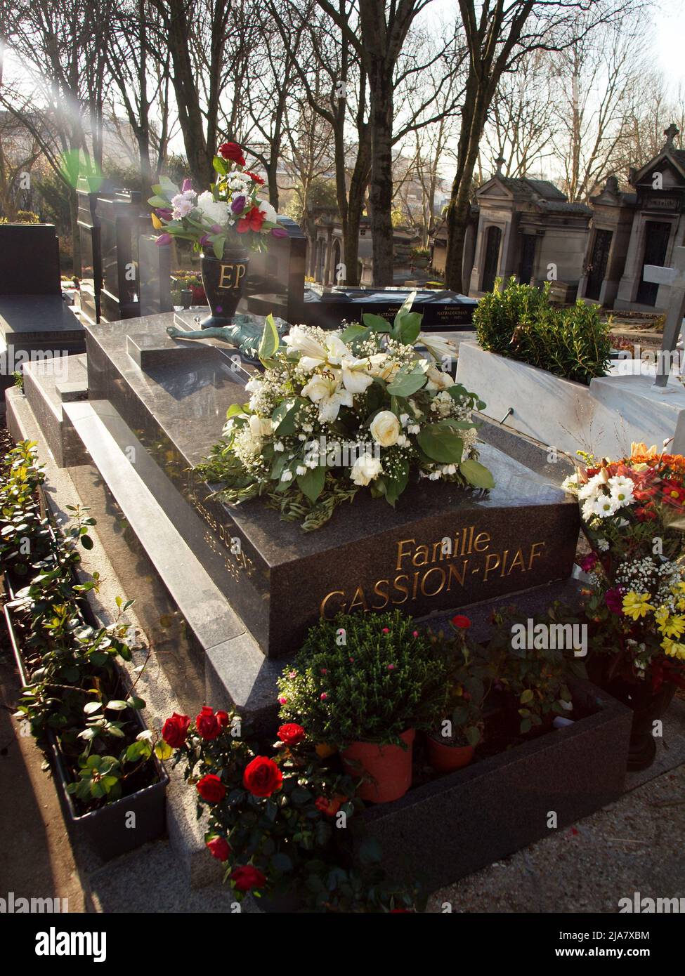 Sunshine on the tomb of Edith Piaf at the Pere Lachaise Cemetery, the ...