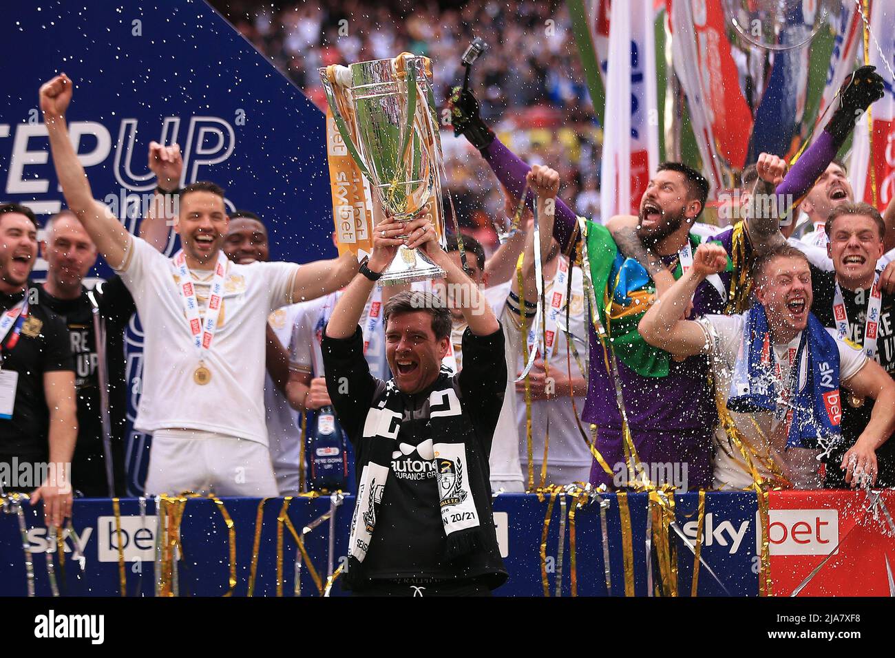 London, UK. 28th May, 2022. Port Vale Manager Darrell Clarke lifts the ...