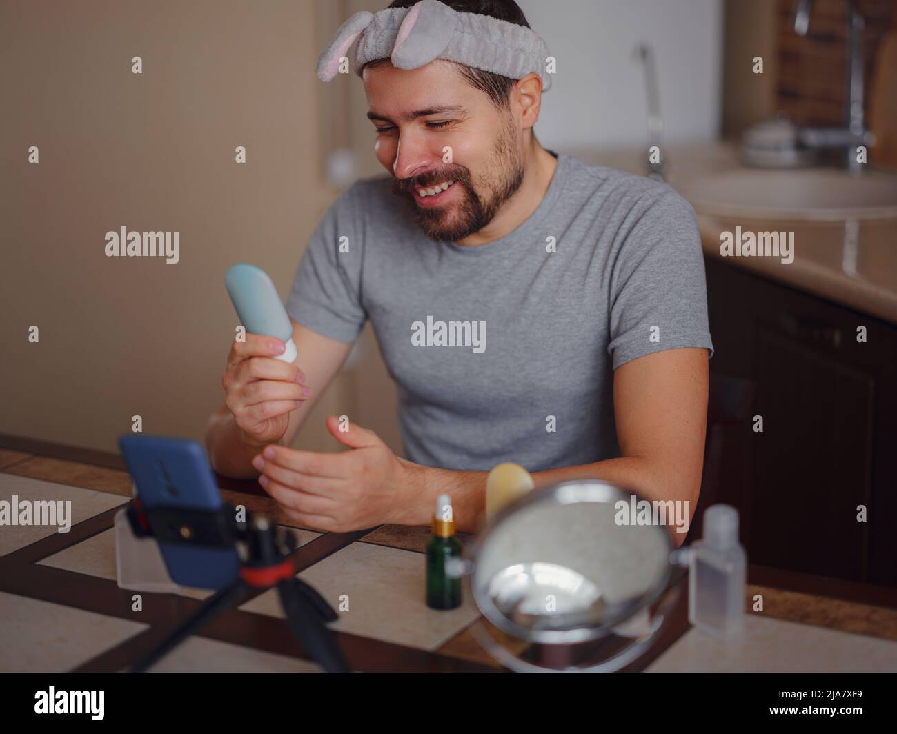 Men's beauty concept. caucAsian guy checking his skin. Beauty blogger ...